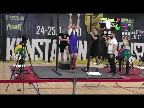 Многоповторные подтягивания с весом 25 кг.