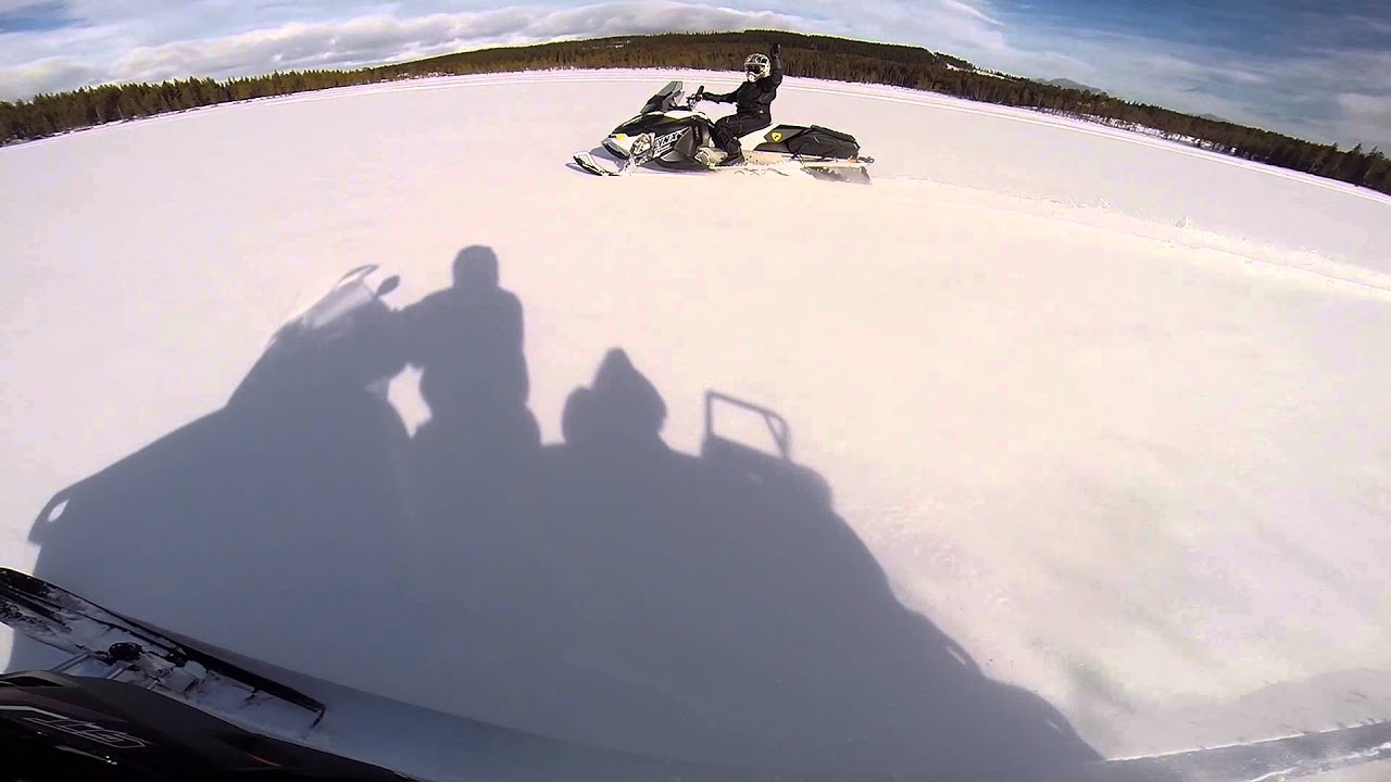 Snowmobile on frozen lake - YouTube