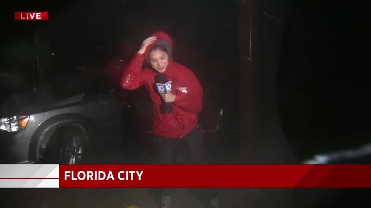 Jenise Fernandez struggles to stand during live report - YouTube