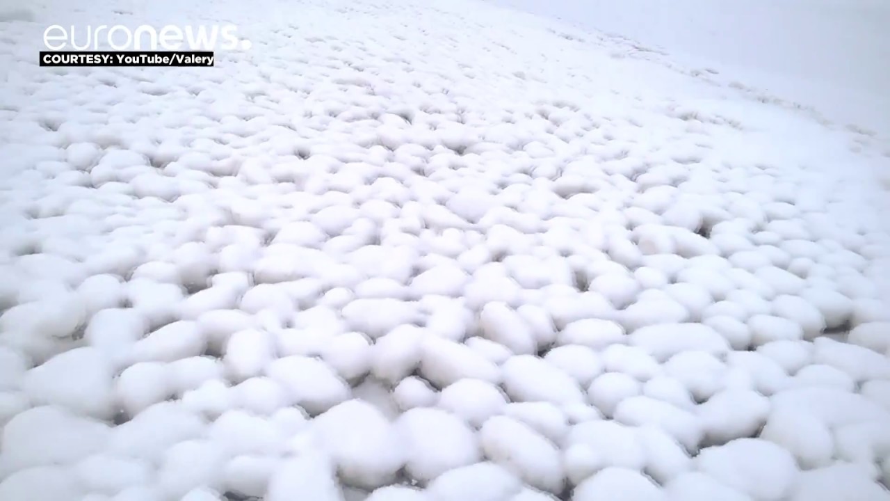 Mysterious giant snowballs form on Siberian Beach - YouTube