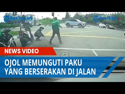 Aksi Ojol Memunguti Paku di Jalan Banjir Pujian Netizen