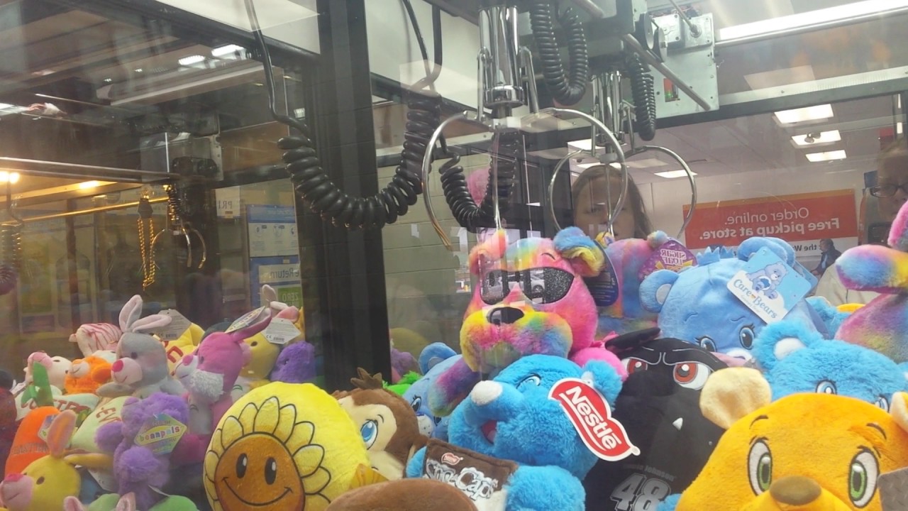 Finding a care bear in prize chute - YouTube