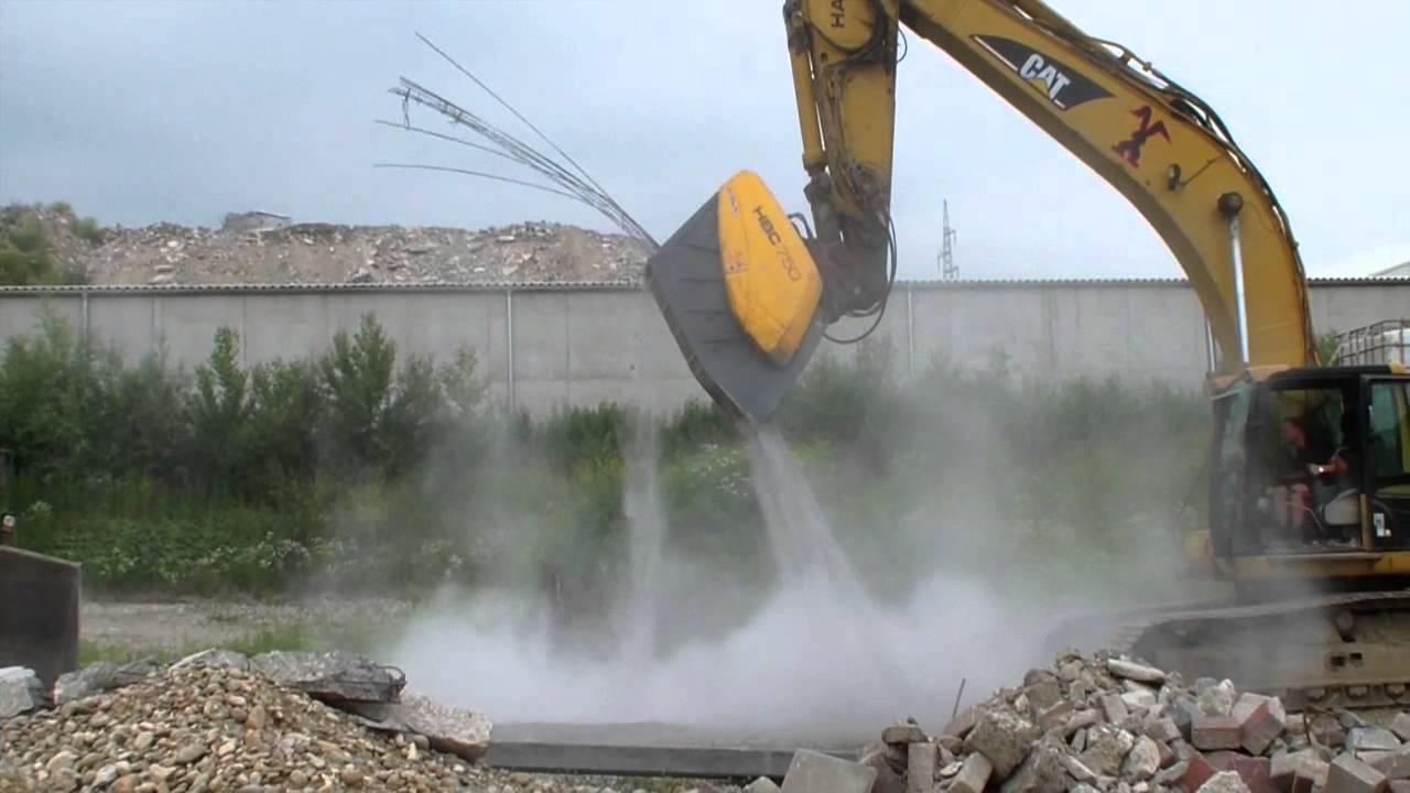 crushing concrete piles - YouTube