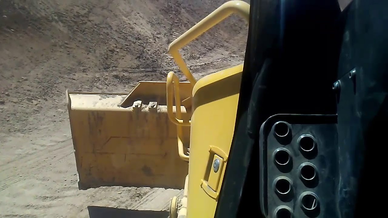 Dozing on side slope. - YouTube