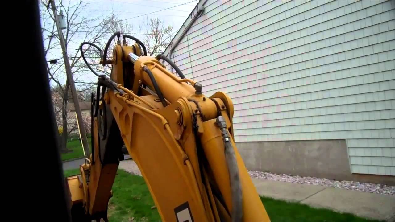 backfill with backhoe - YouTube