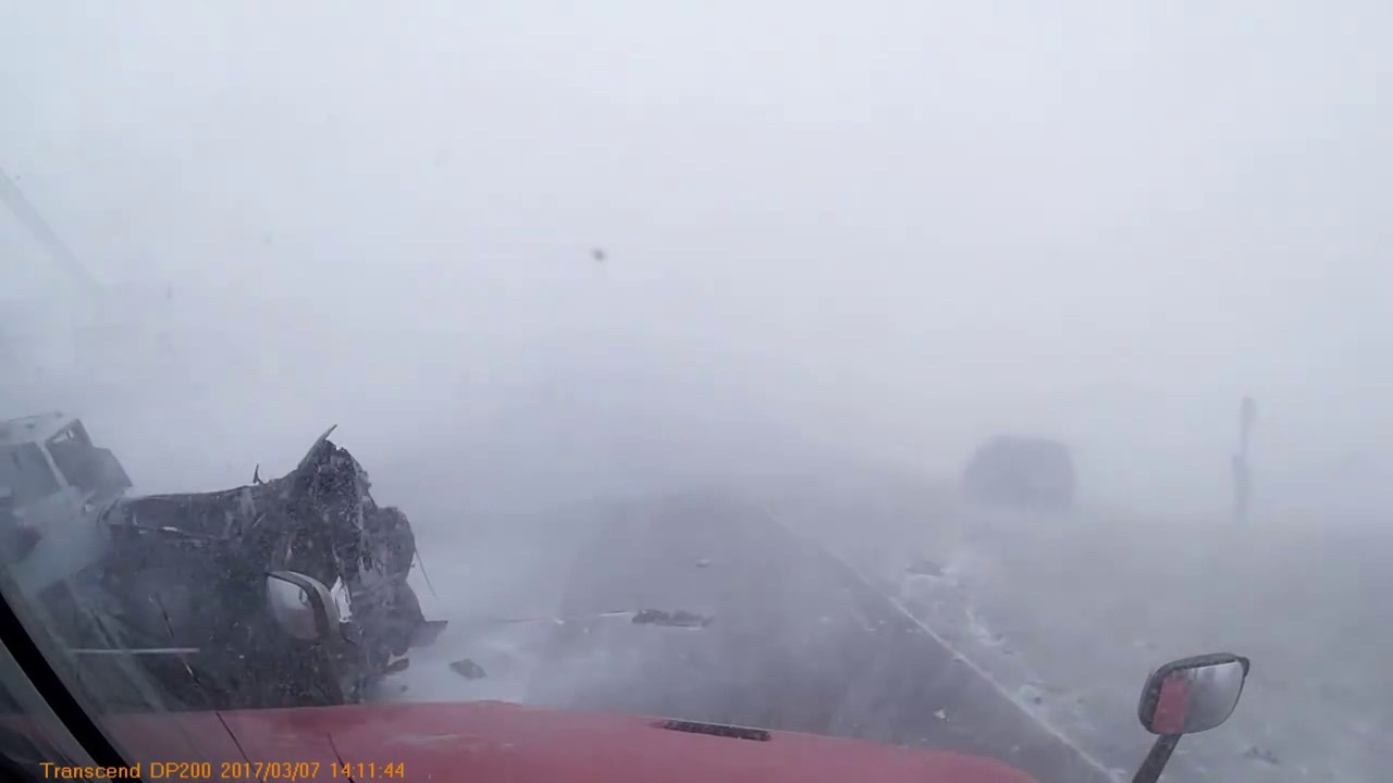 Driving into a instant white out - YouTube