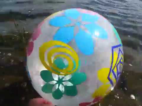 Beachball deflate in water - YouTube