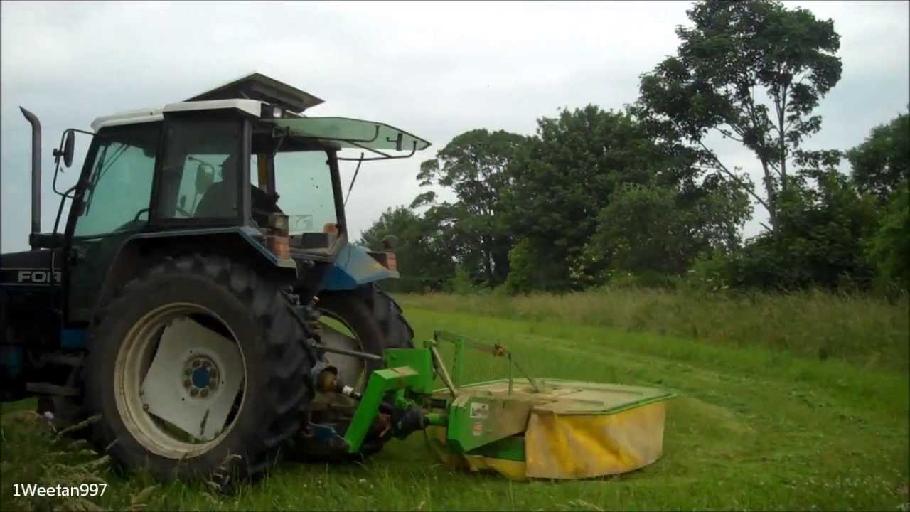 Ford 7740 mowing grass, second cut silage 2013 - YouTube