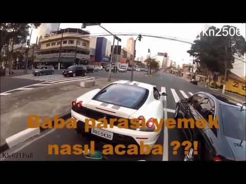 FERRARİYİ TOKATLAYAN MOTORCU!