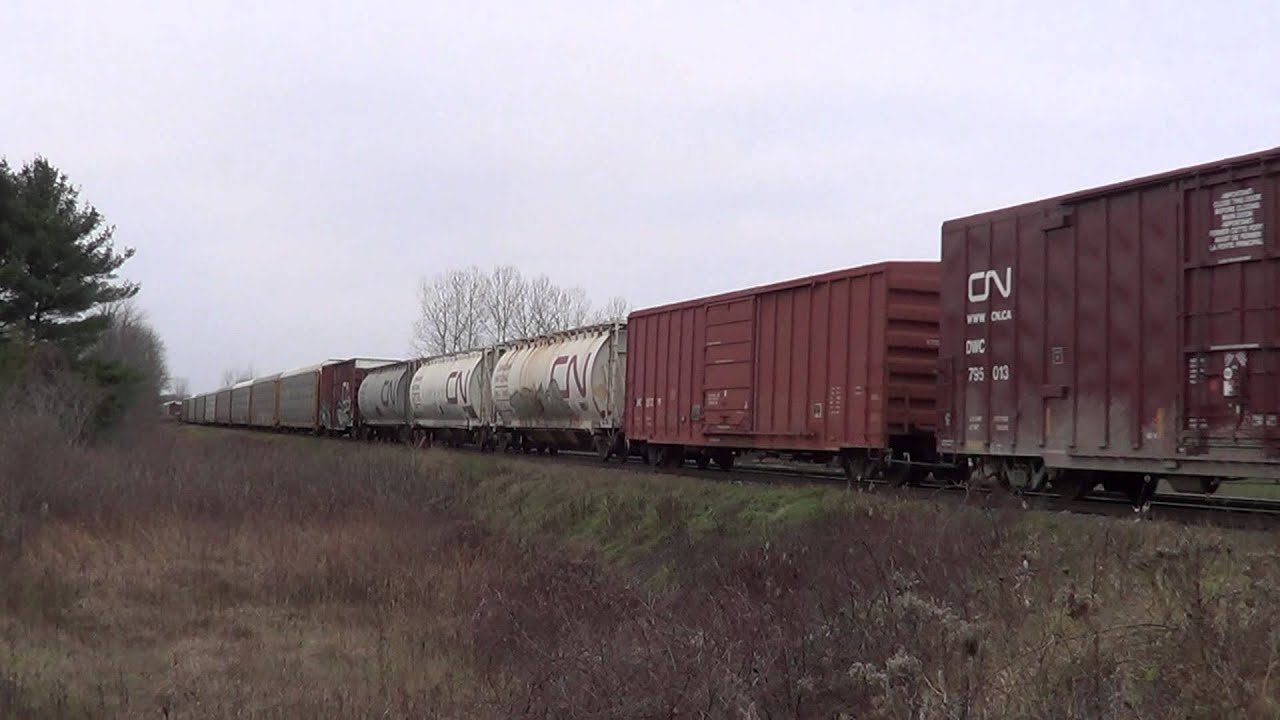CN M332 with 9-44CWL CN 2502 leading by melrose diamond 00002.MTS - YouTube