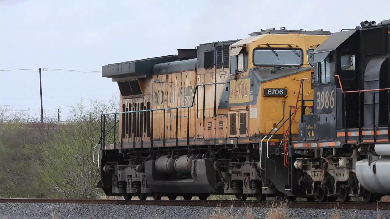 UP 6706 The last CNW patched unit 300 subscriber special + emd smoke show Olmito TX - YouTube