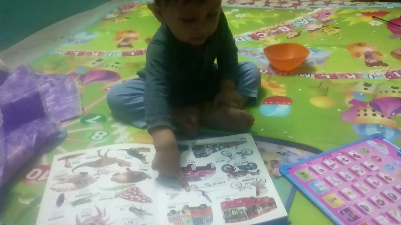 15 months old reading books! - YouTube