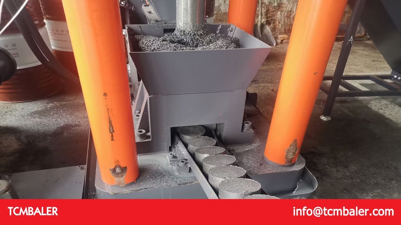 automatic metal chips iron ore fines briquette machine - YouTube