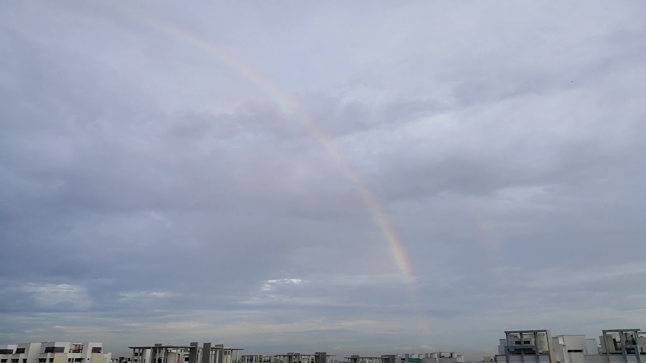 Fighter plane flying through a rainbow in SG - YouTube