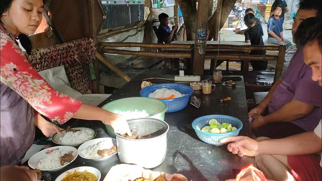 Indonesian Village people eat together to celebrate new born child ...