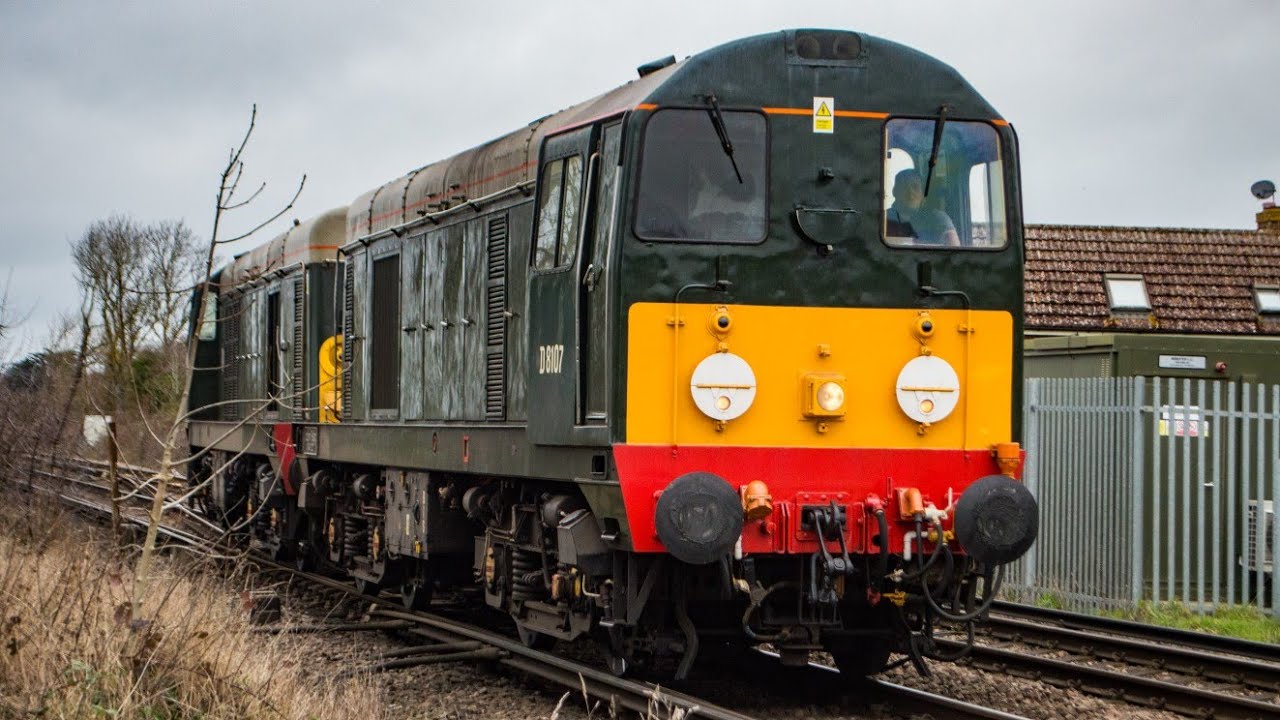 Class 20s, 20107 and 20096, slowly run Light Engine through Minster ...
