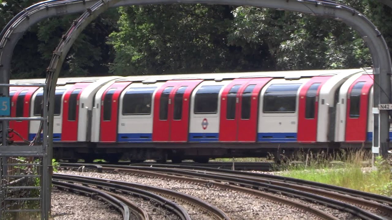 Central Line train approaching Woodford station - YouTube