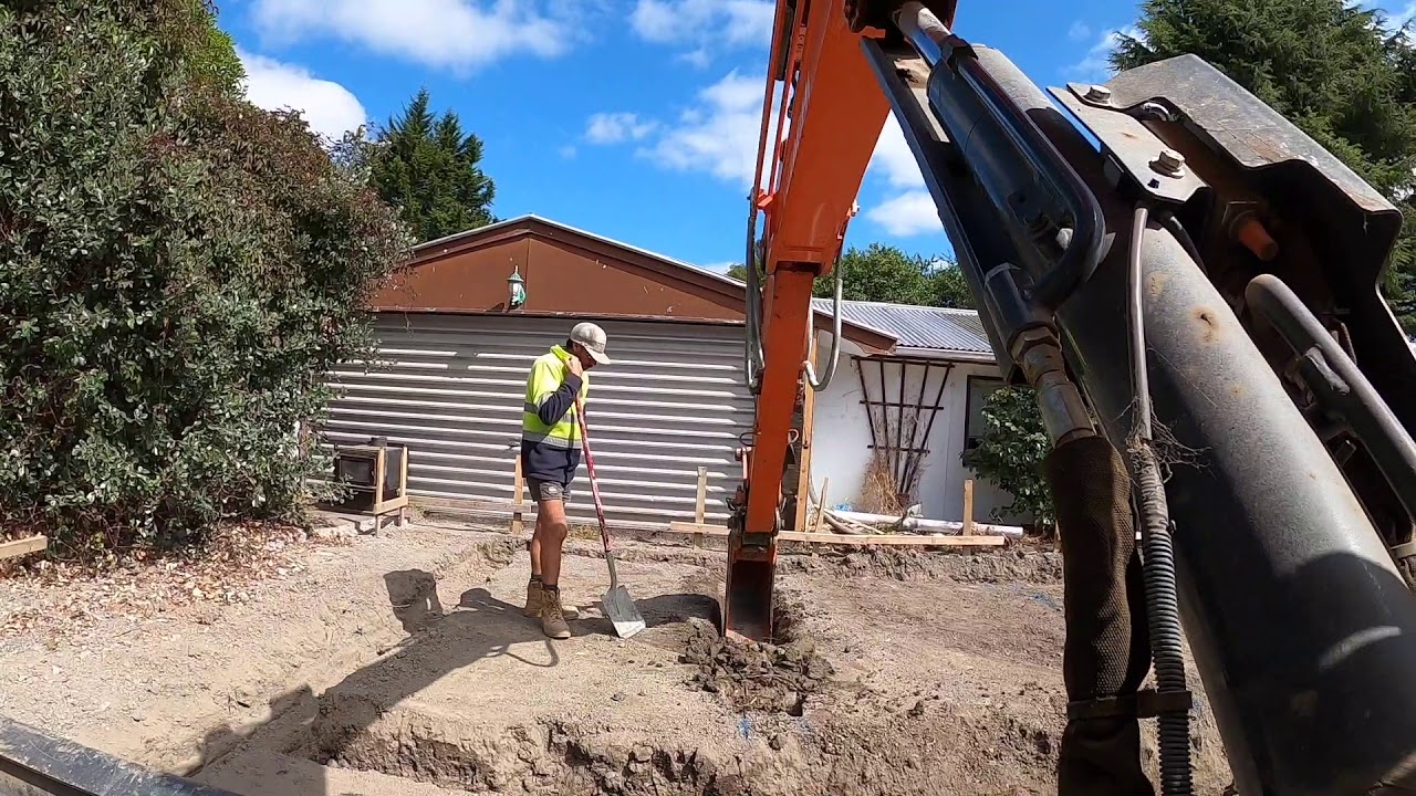 Digging Out House Foundation Footings - Timelapse - YouTube