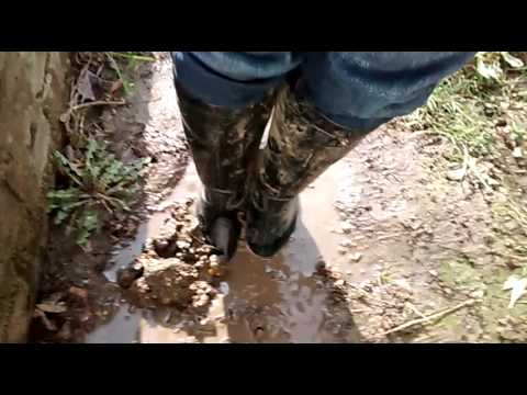 Black riding boots in mud - YouTube