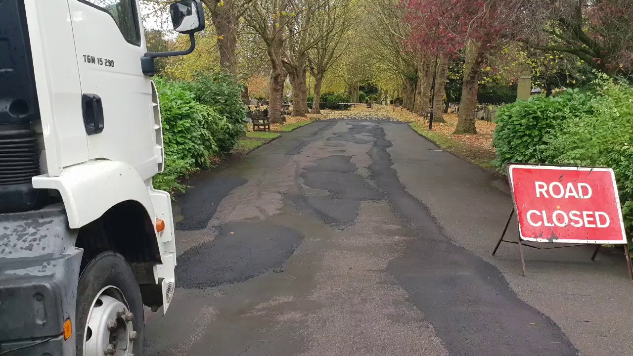 Asphalt tarmac patching or repairs slurry seal micro surfacing - YouTube