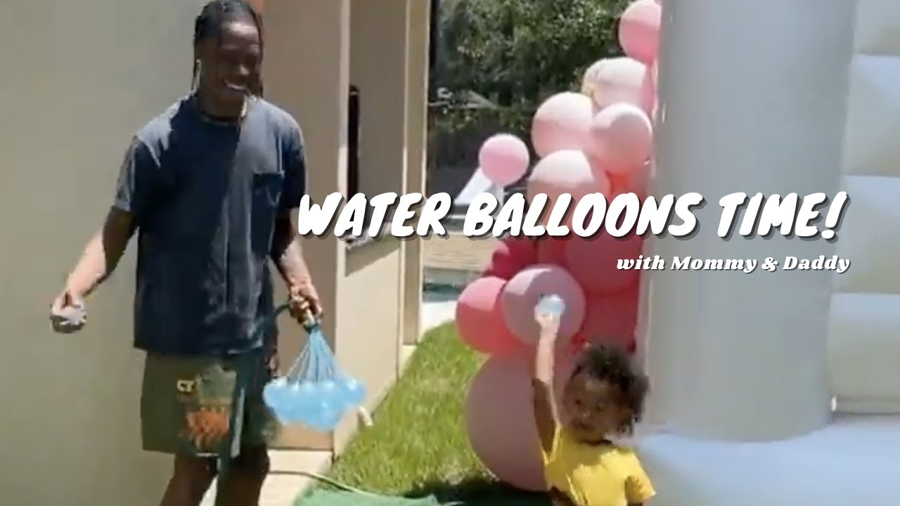Stormi & Travis Scott Play Water Balloons - YouTube