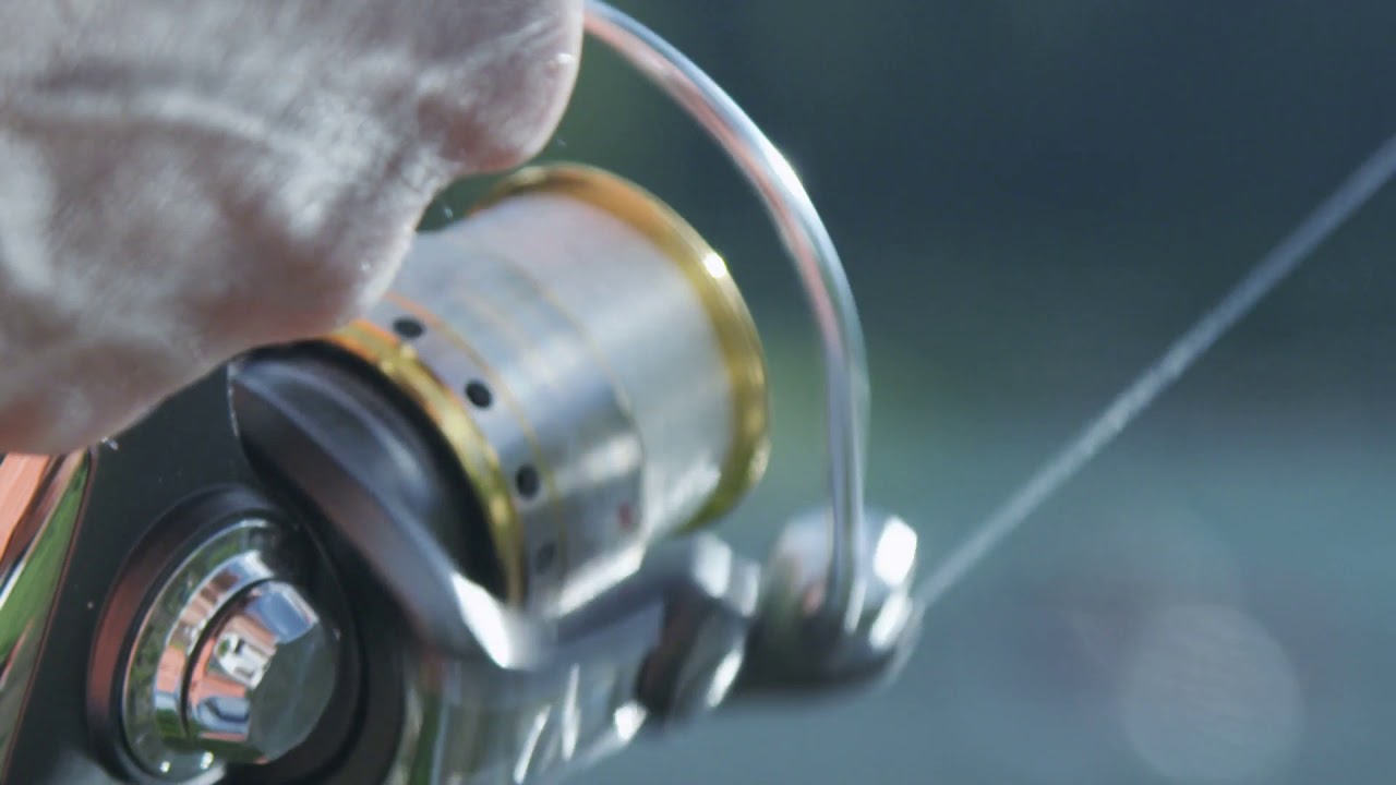 slow motion of spinning reel - YouTube