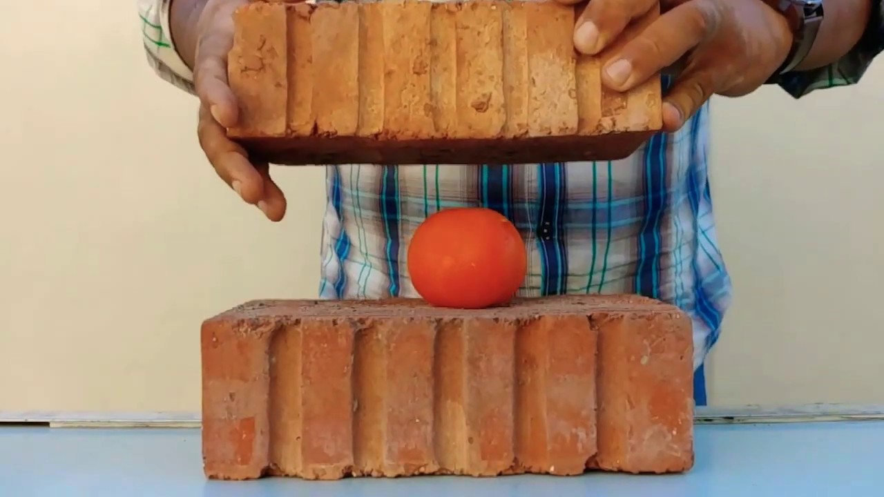 Squashing a Tomatoe with Bricks in Slow Mo - YouTube