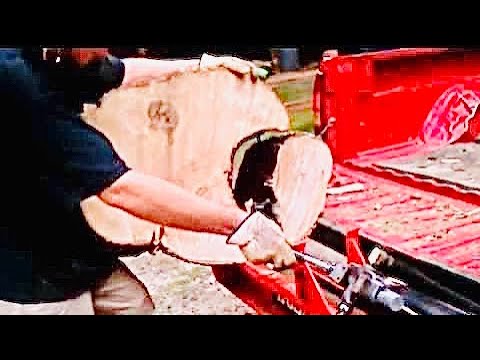 Splitting HUGE ash log with Huskee 22 ton splitter - YouTube