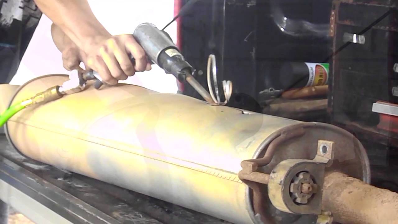Inside look of a factory Ford muffler - YouTube