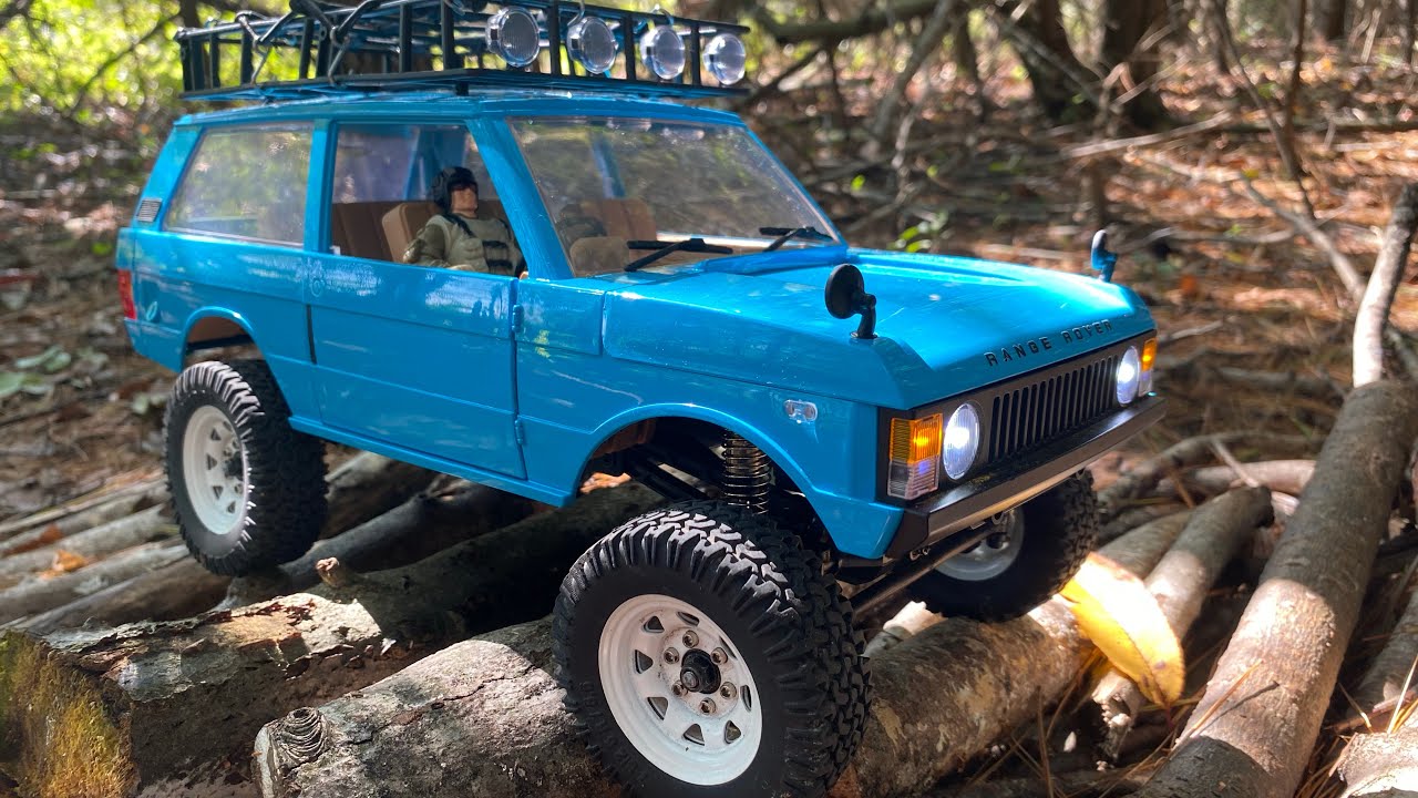 MNRC MN168 licensed Range Rover scale trail driving in the woods - YouTube