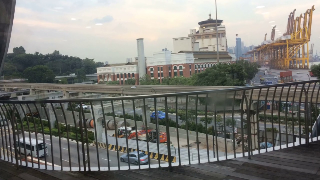 Sentosa Express Hitachi Small-type Monorail [Orange Trainset] arriving ...