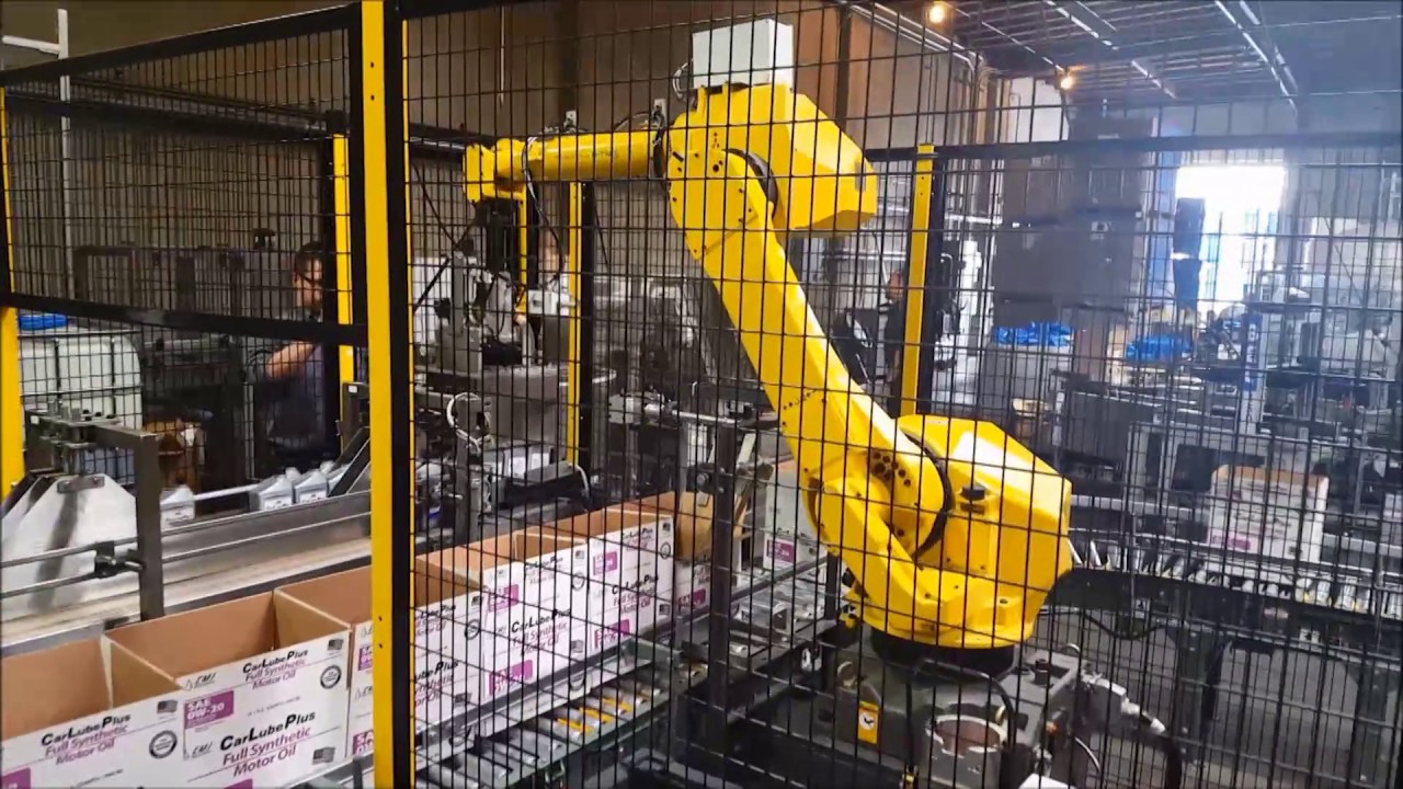 Case Packing Motor Oil with FANUC M 710iC 50H TransAutomation ...