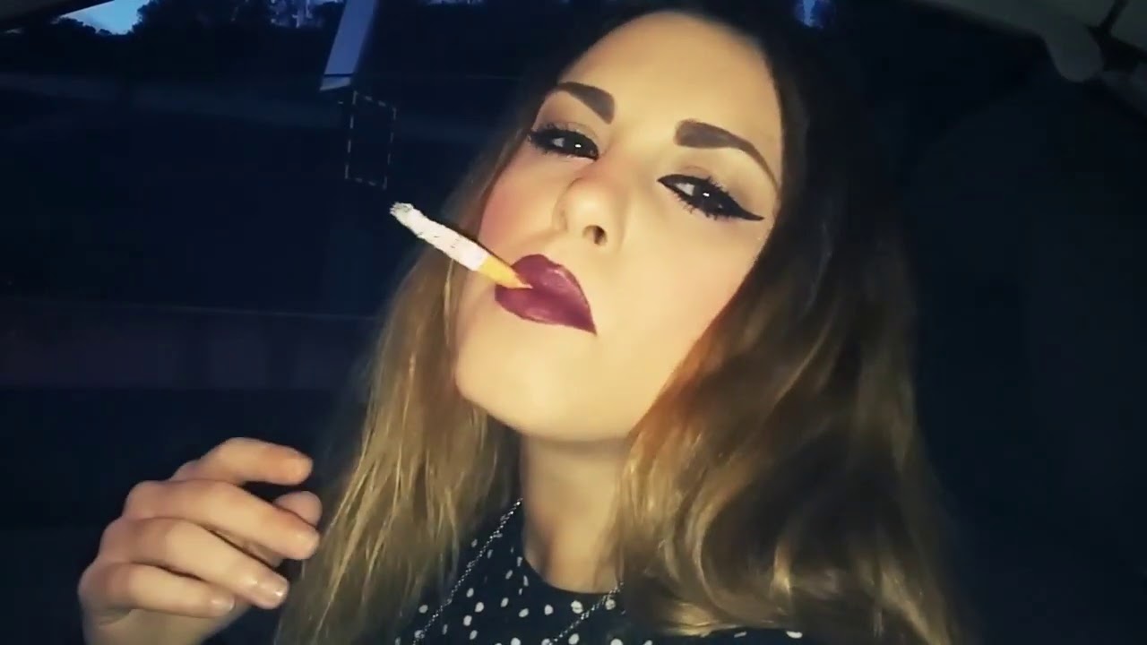 Woman chain smokes in a car - YouTube