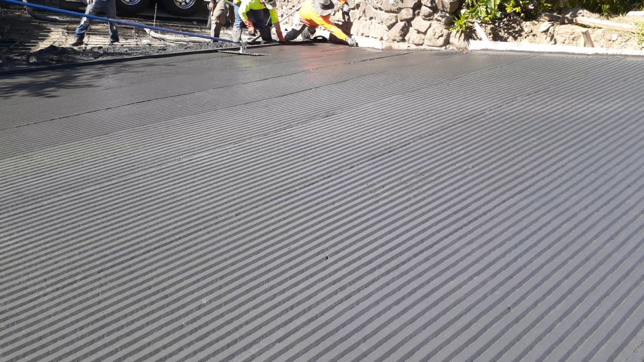 Veterans concrete,...continue deep groove @ new driveway - YouTube