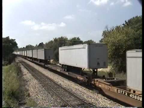 ATSF#925 ducks under it's future merger partner's bridge,Burlington Northern@Galesburg,ILL - YouTube