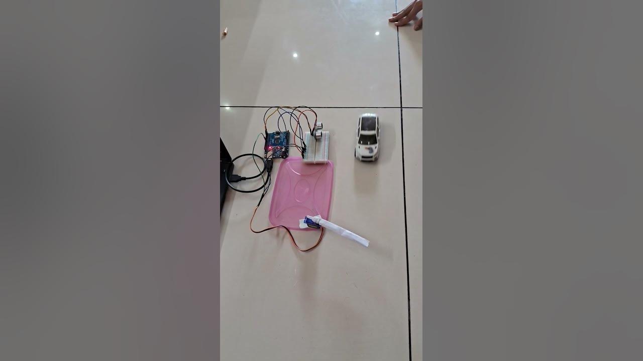 Automatic Toll Gate Using Ultrasonic Sensor And Servo Motor And Arduino