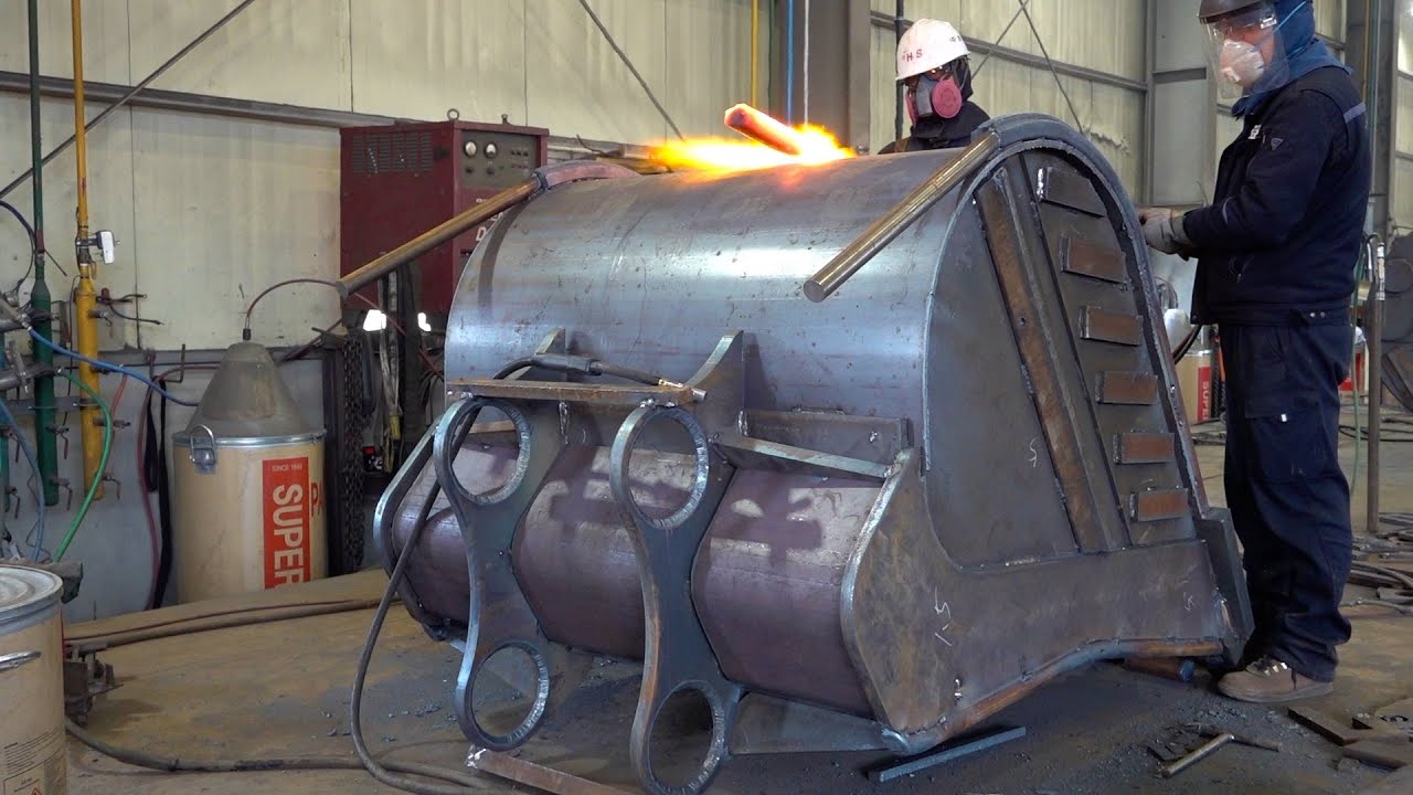 Process of Making Strong Excavator Bucket. Heavy Equipment ...