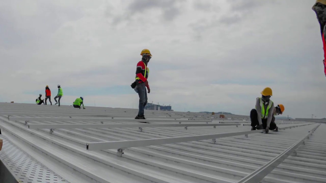 Time Lapse - Solar cell rail installation on roof top - YouTube