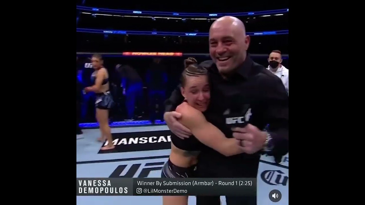 UFC fighter Vanessa Demopoulos jumps into Joe Rogan hands during ...