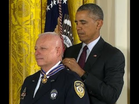 Officer Greg Stevens receives Medal of Valor from President - YouTube