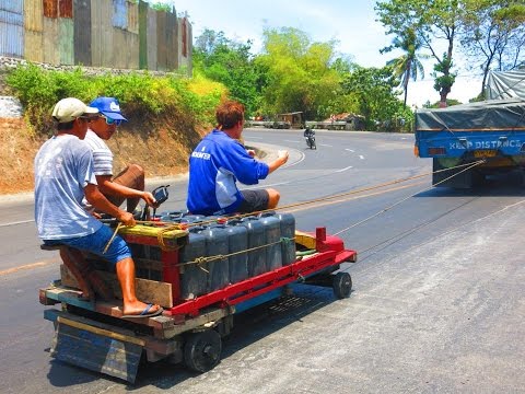 Filipino Giant Wooden Go Karts Behind Cars - Transporting Water With ...