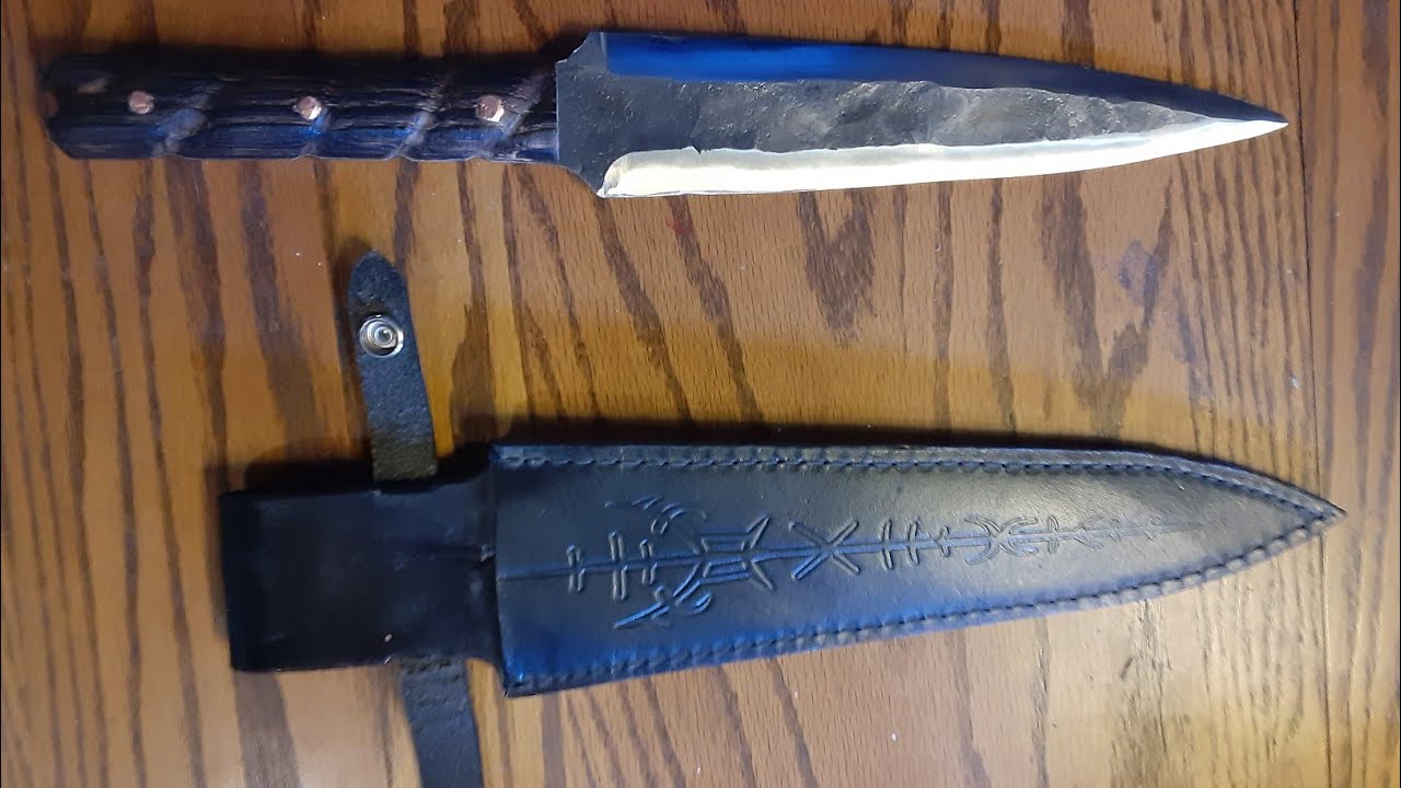 Forging a dagger by hand. - YouTube