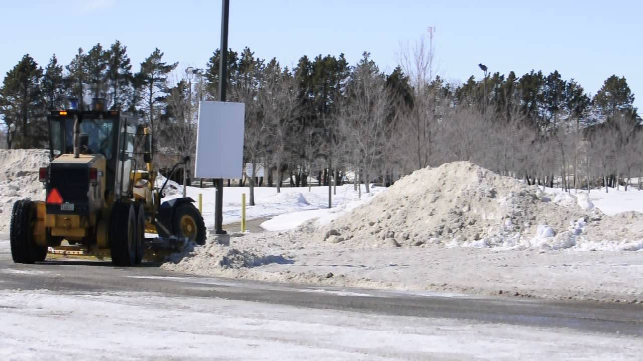 Grader snow removal - YouTube
