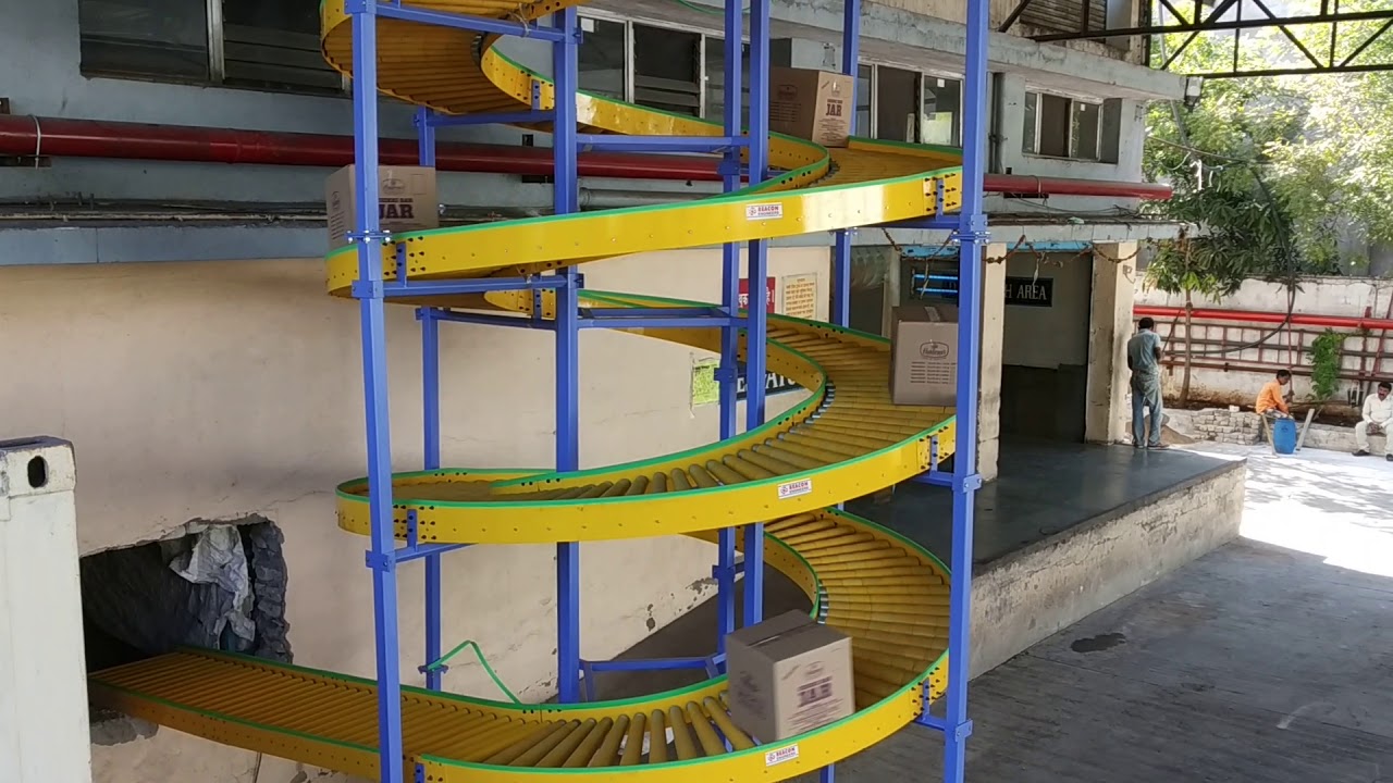 BEACON'S GRAVITY SPIRAL ROLLER CONVEYOR - YouTube