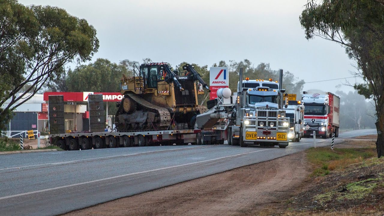 Australian Kenworth C509 hauling oversize load CAT D11 bulldozer ...