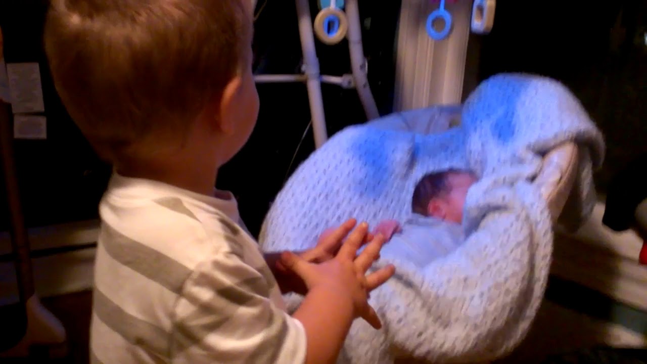 Chris rocking Charlie - YouTube