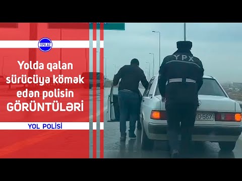 Yolda qalan sürücüyə kömək edən polisin GÖRÜNTÜLƏRİ