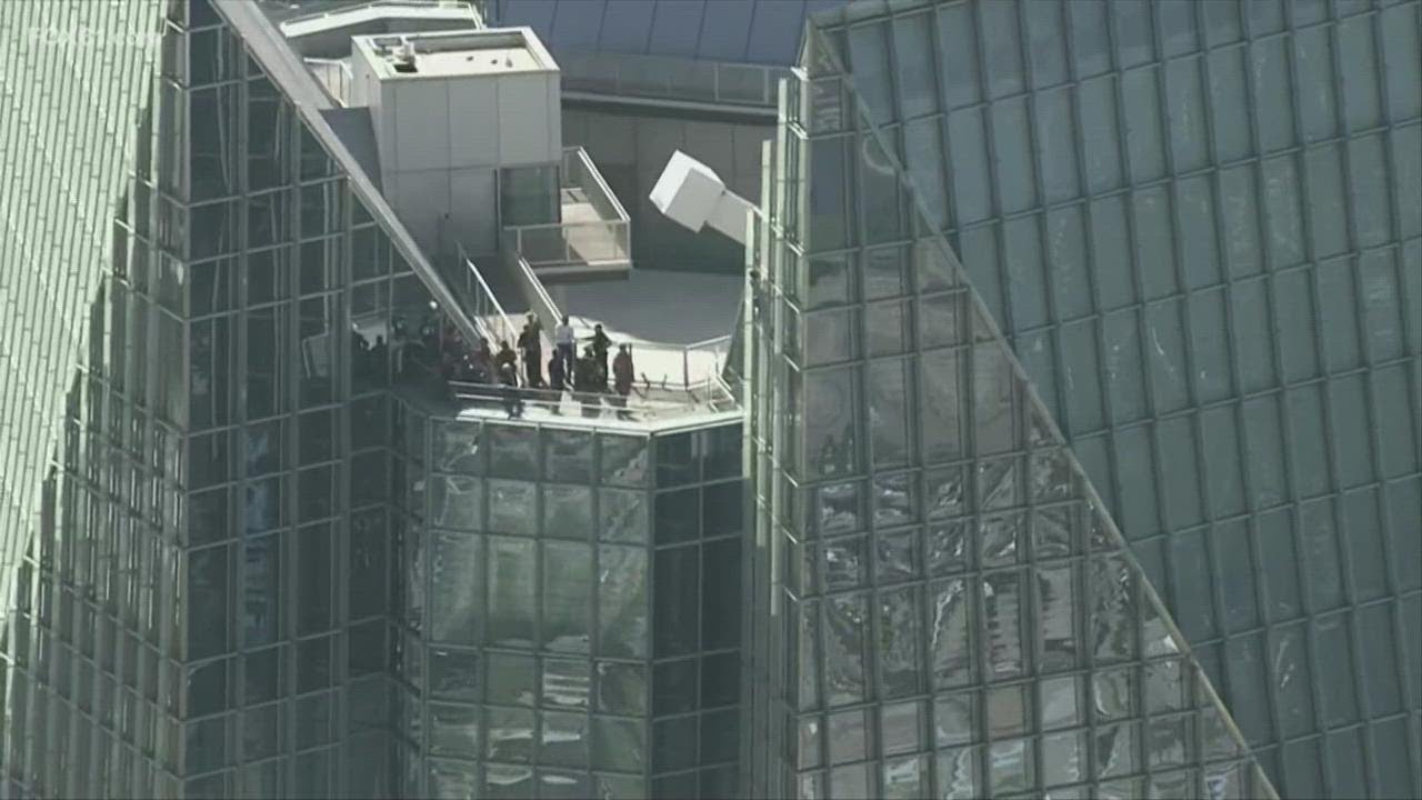 Person scales tallest building in Oklahoma - YouTube