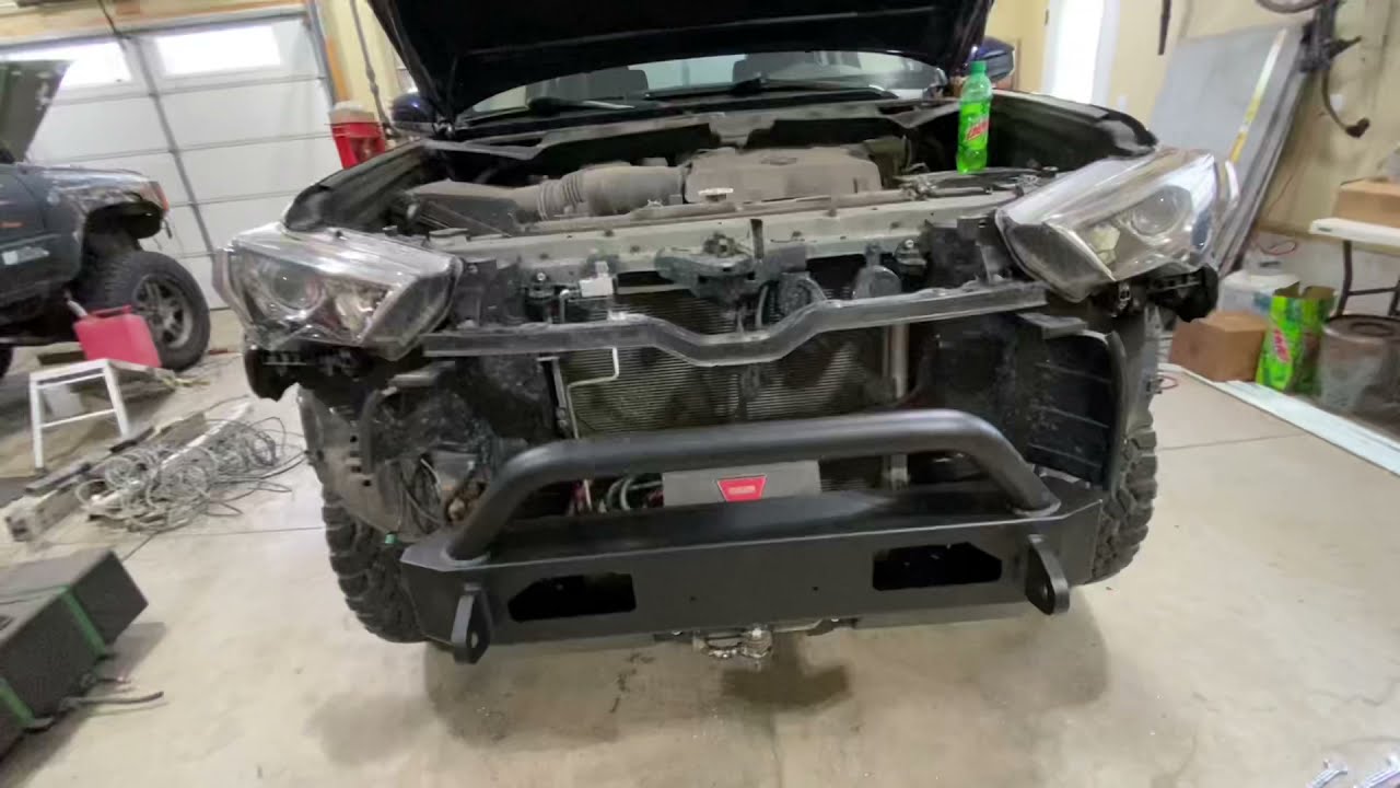 Installing the Warn 100022 winch bumper and x8000i winch on our 5th gen ...