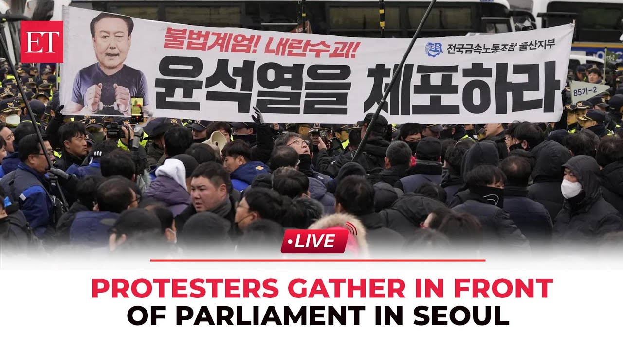 South Korea's President Yeol faces angry protestors outside parliament ...